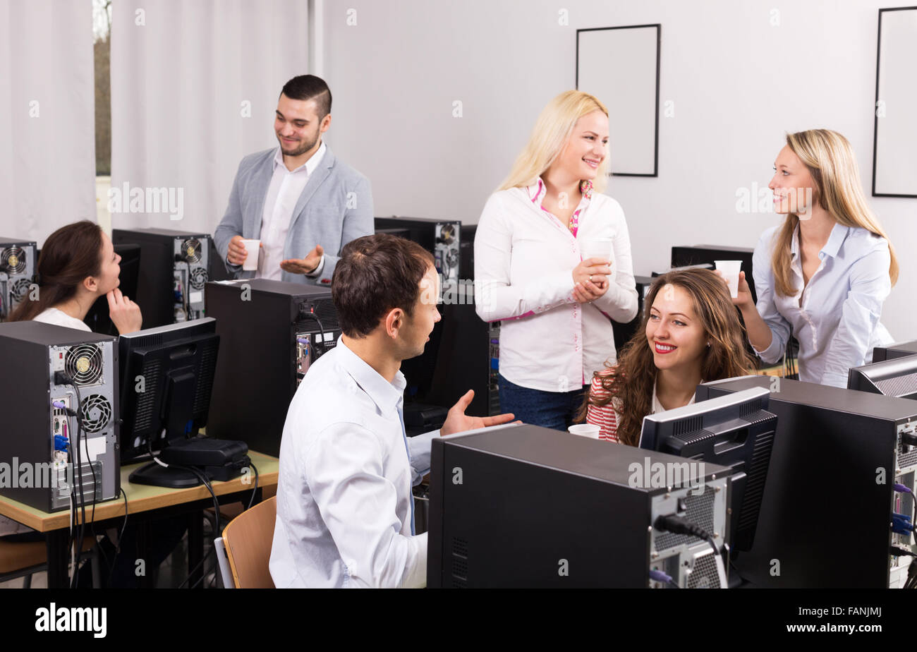 Employees and happy manager celebrating good dealing. Focus on the ...