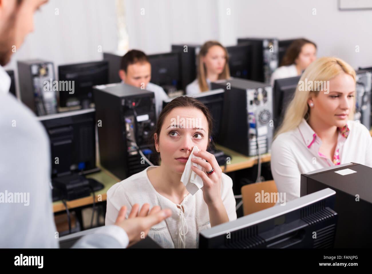 Furious boss and crying clerk at open space working area Stock Photo ...