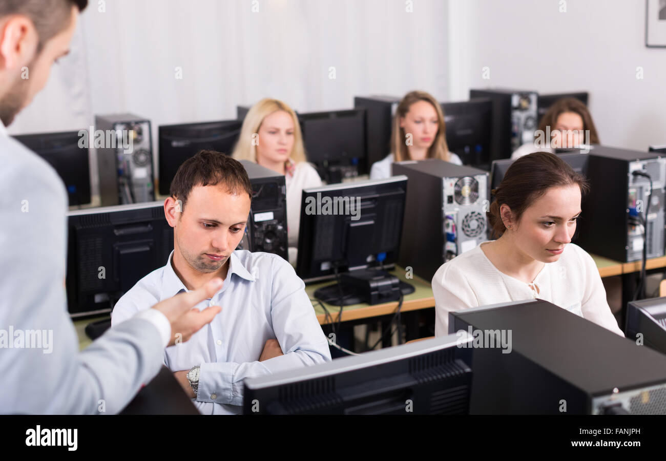 Furious supervisor scolding upset office worker Stock Photo - Alamy