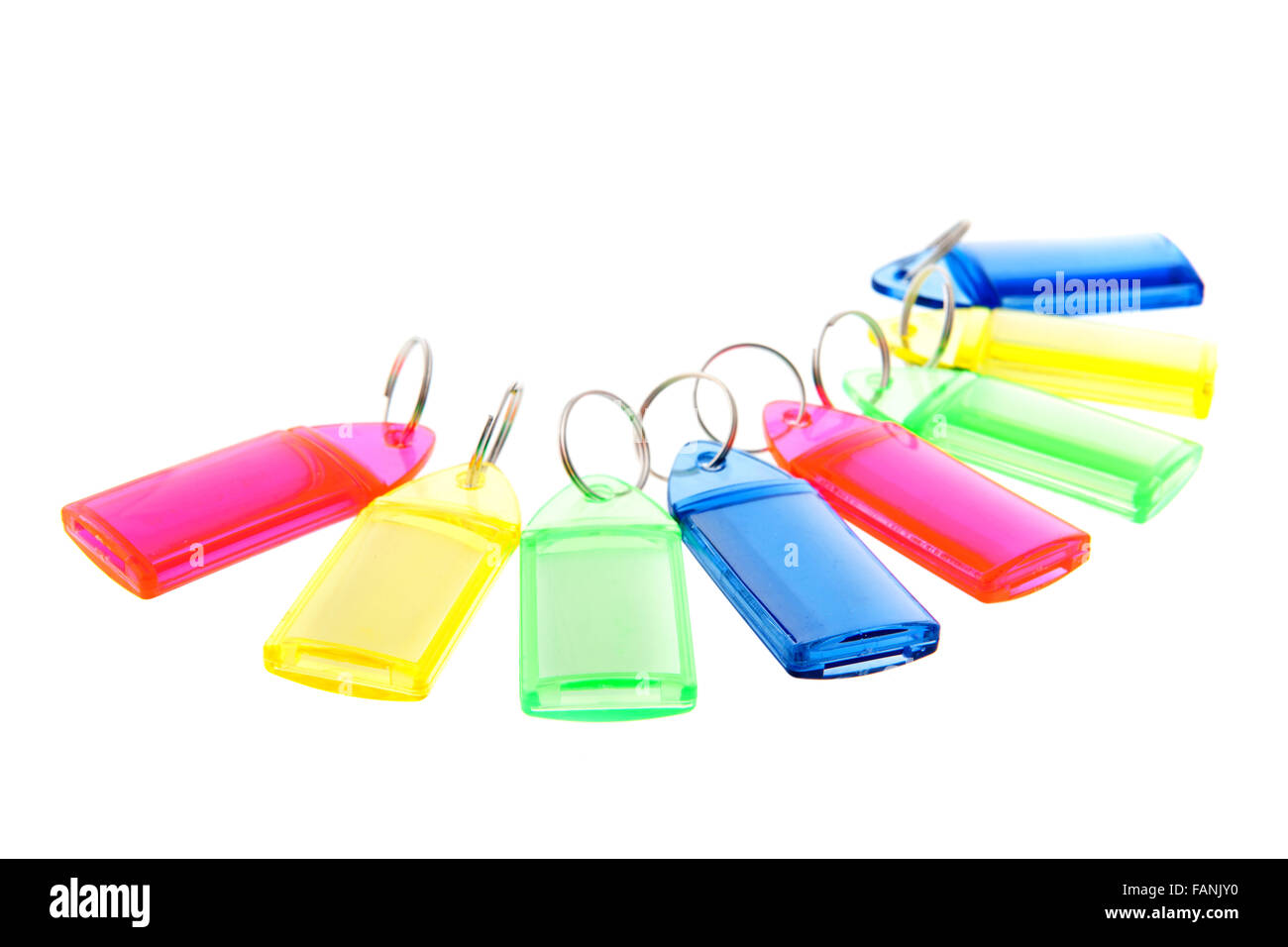 Row colorful key rings isolated over white background Stock Photo - Alamy