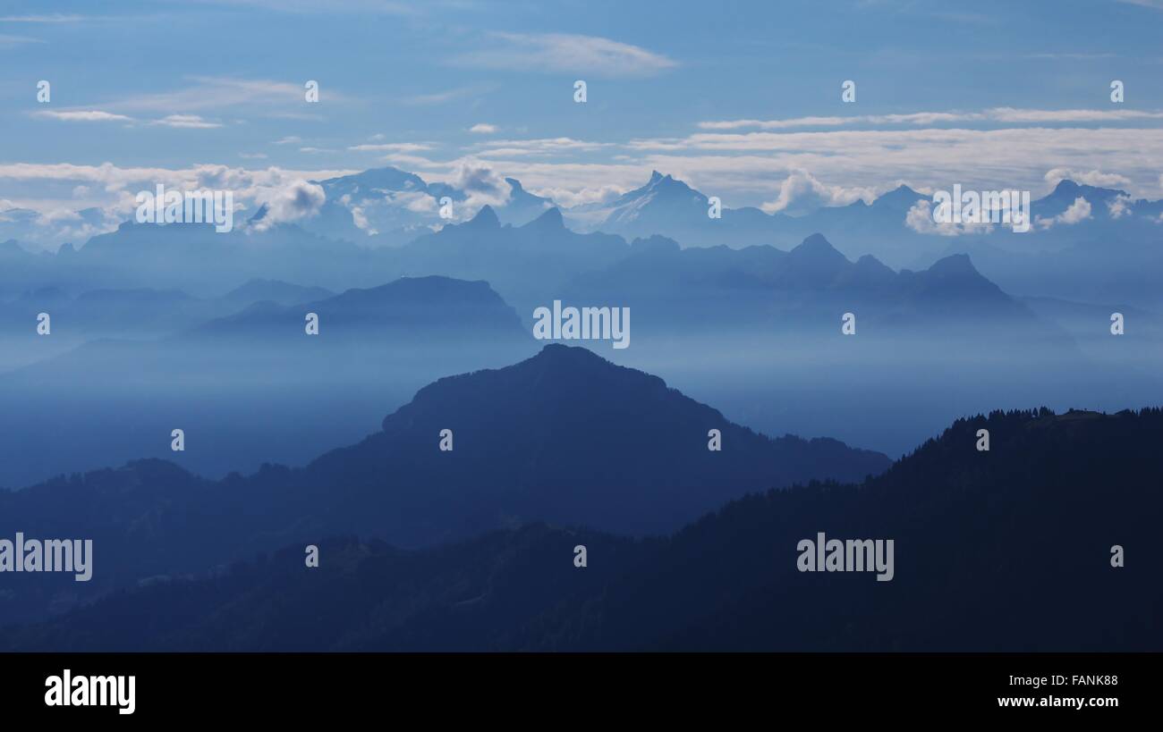 View from the Rigi, backlit mountain ranges Stock Photo - Alamy