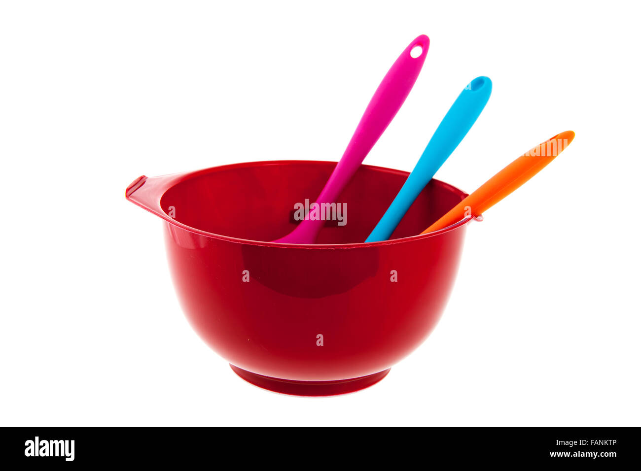 Red bowl with kitchen tools isolated over white background Stock Photo ...