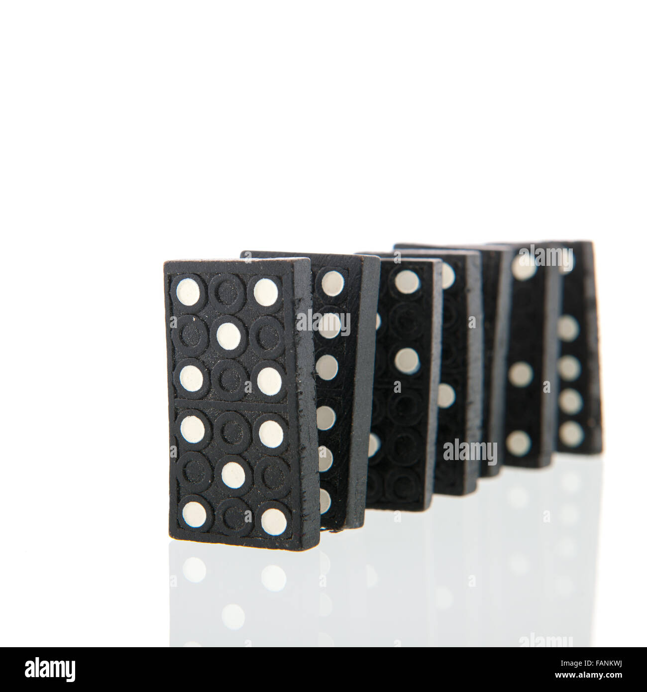 Row domino cards isolated over white background Stock Photo - Alamy