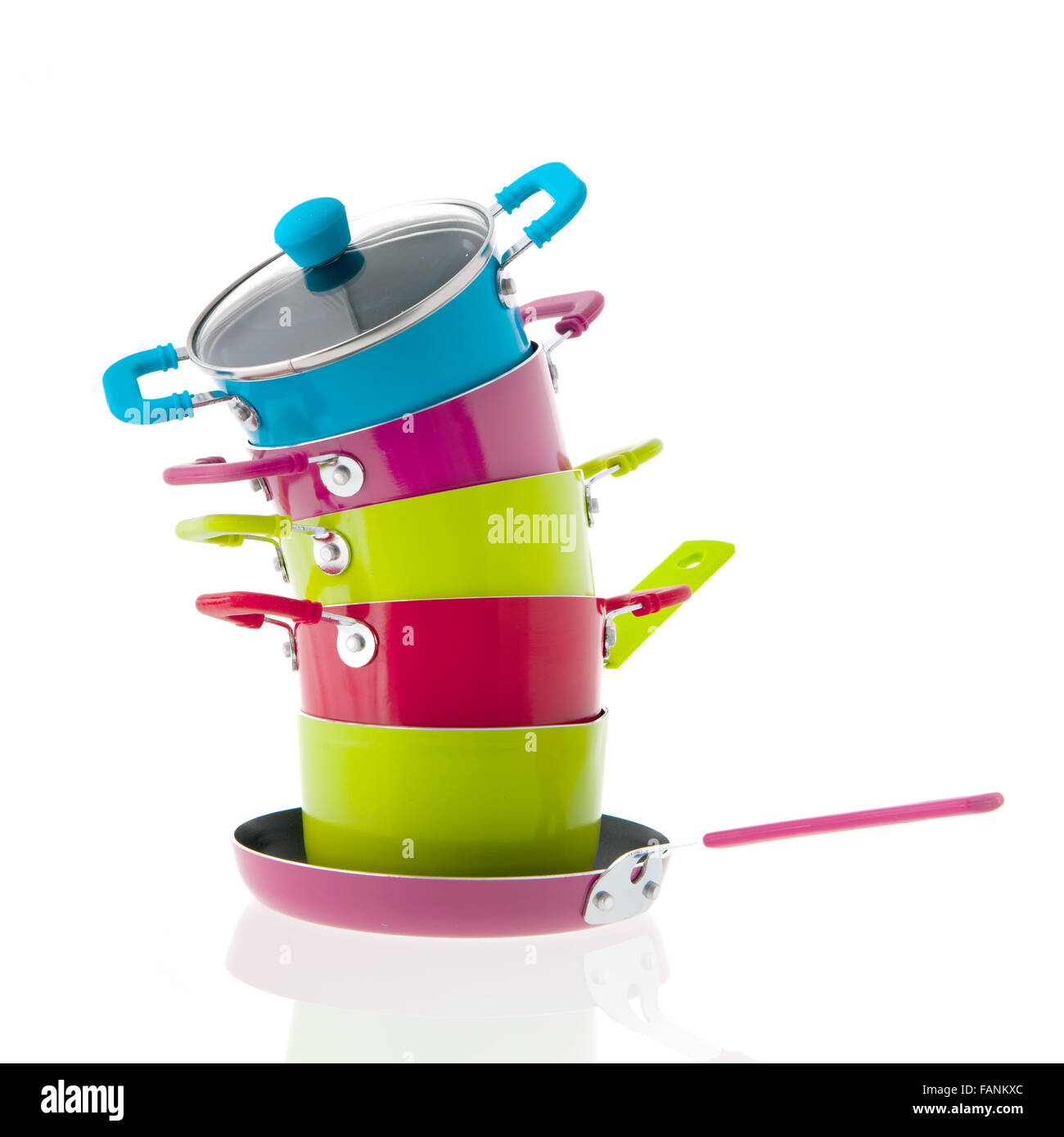 Stacked pots for cooking isolated over white background Stock Photo - Alamy