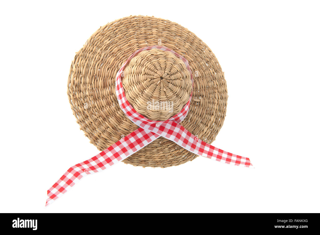 wicker summer hat with red checkered ribbon Stock Photo - Alamy