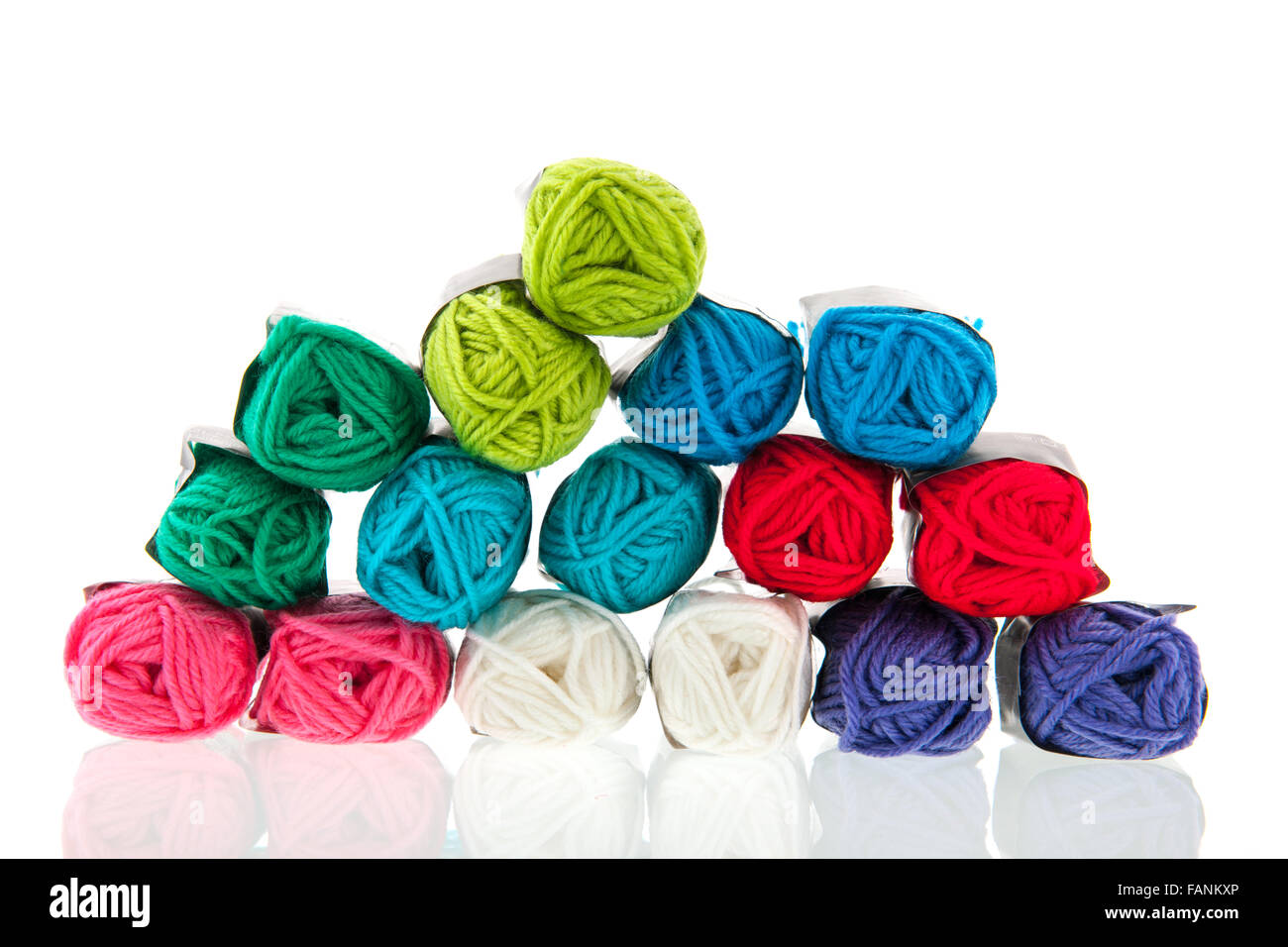 Many balls of colorful wool isolated over white background Stock Photo ...