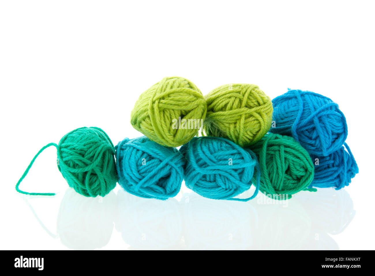 Many balls of colorful wool isolated over white background Stock Photo ...