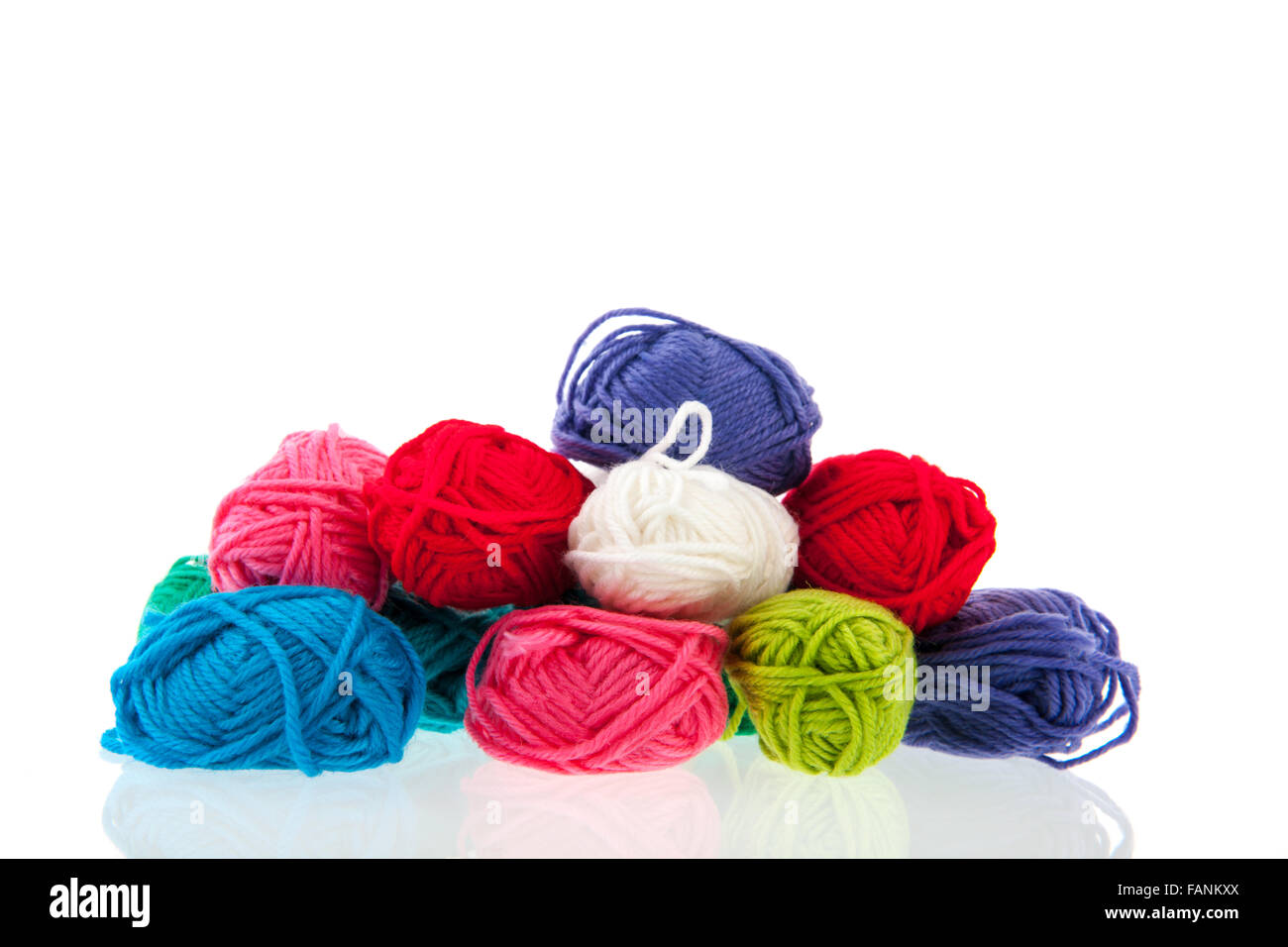 Many balls of colorful wool isolated over white background Stock Photo ...