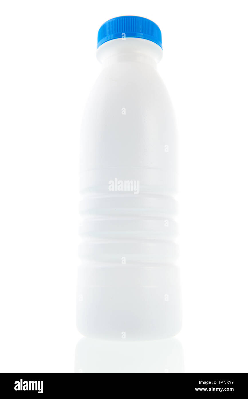 white plastic milk bottle with blue cap isolated over white background ...