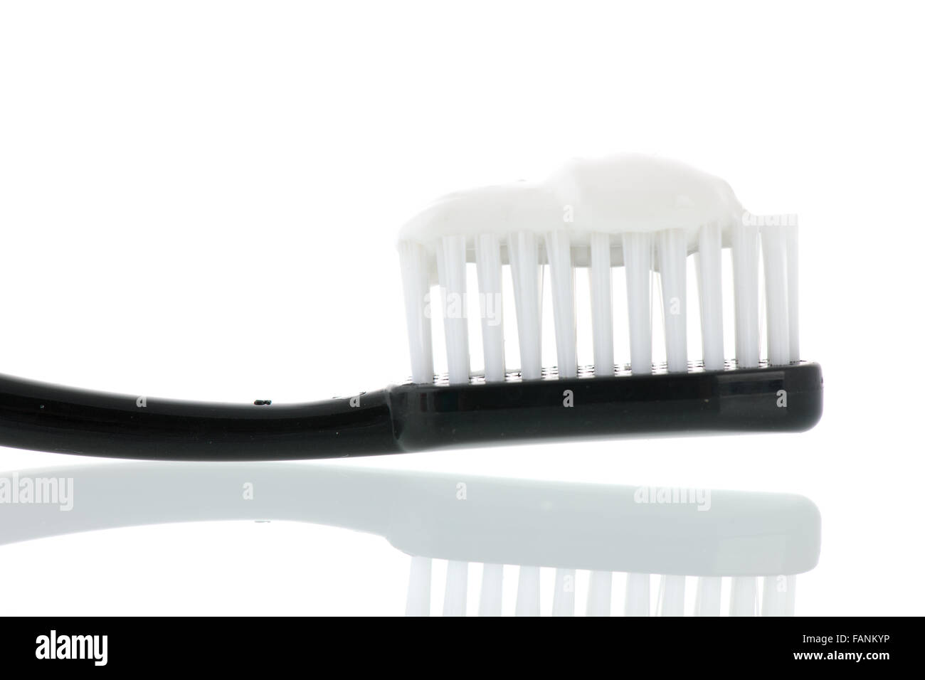 Tooth brush with paste isolated over white background Stock Photo - Alamy