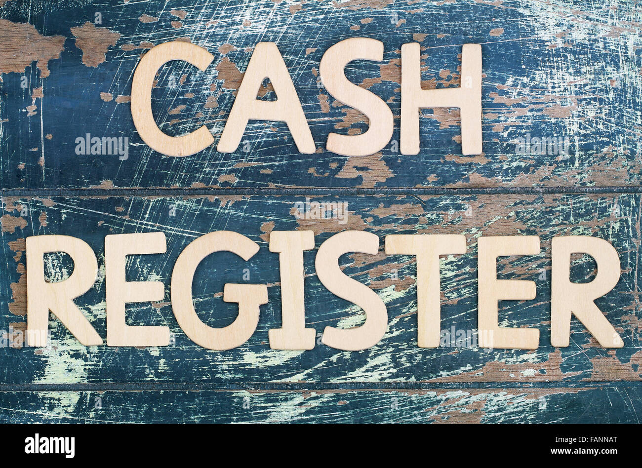 Cash register written with wooden letters on rustic surface Stock Photo ...