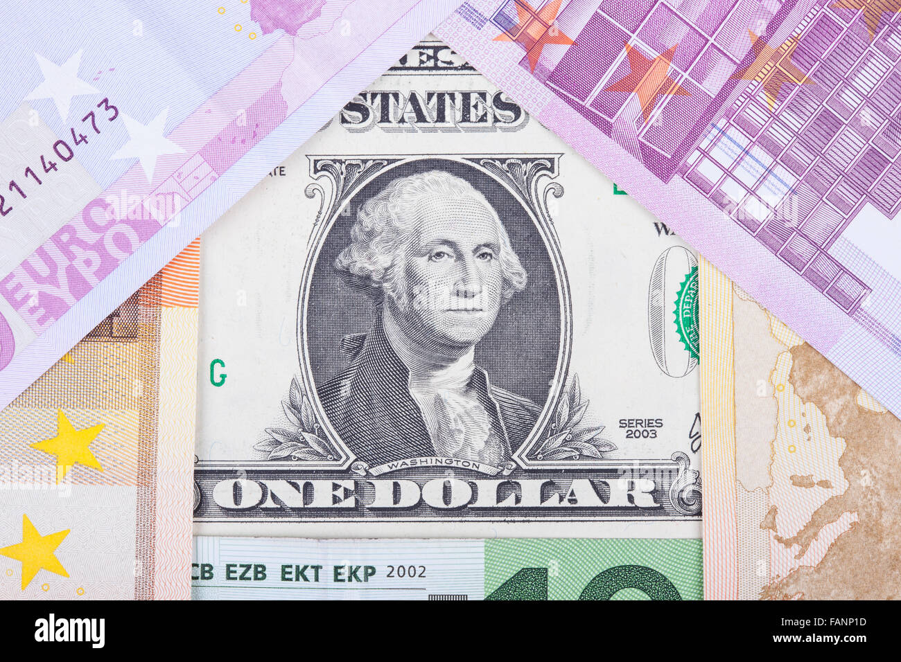 banknotes euro and dollar in the form of house Stock Photo - Alamy