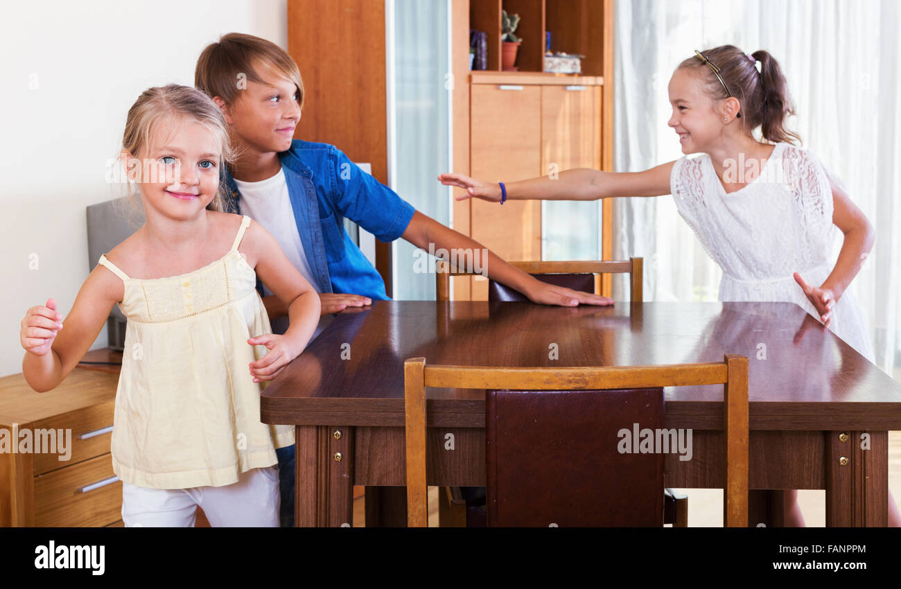 happy smiling child chasing other kids to tag or touch them Stock Photo ...