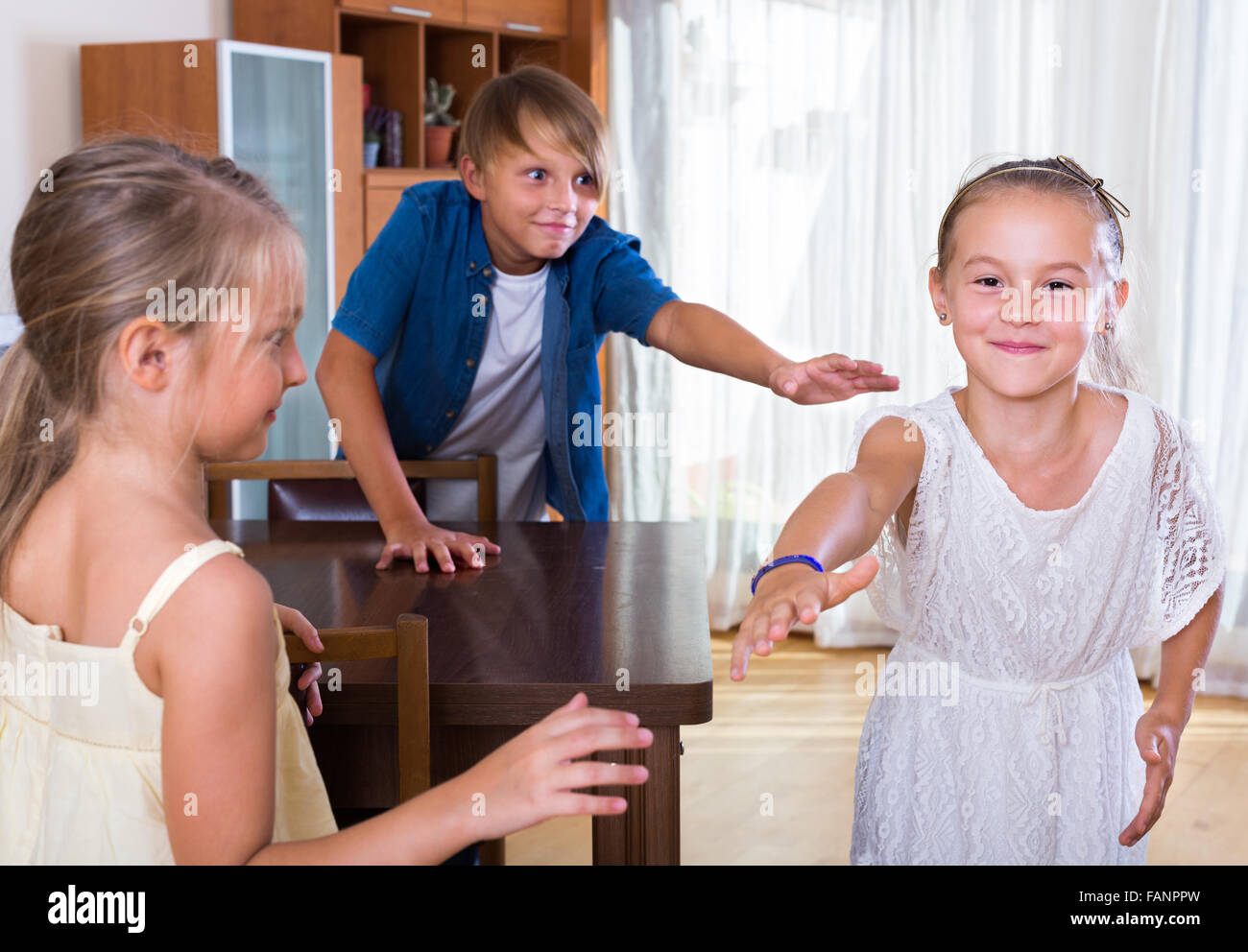 russian children playing romp game Touch-last at home Stock Photo - Alamy