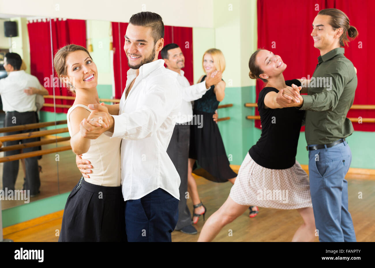 happy american men and women having dancing class in studio Stock Photo ...