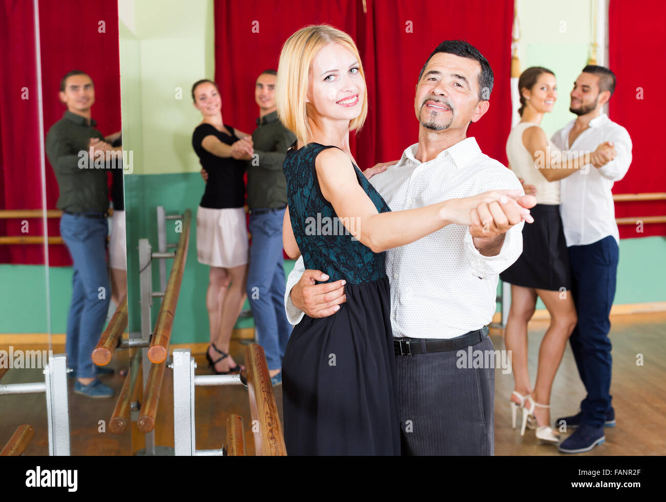 adults couple having dancing class in studio Stock Photo - Alamy