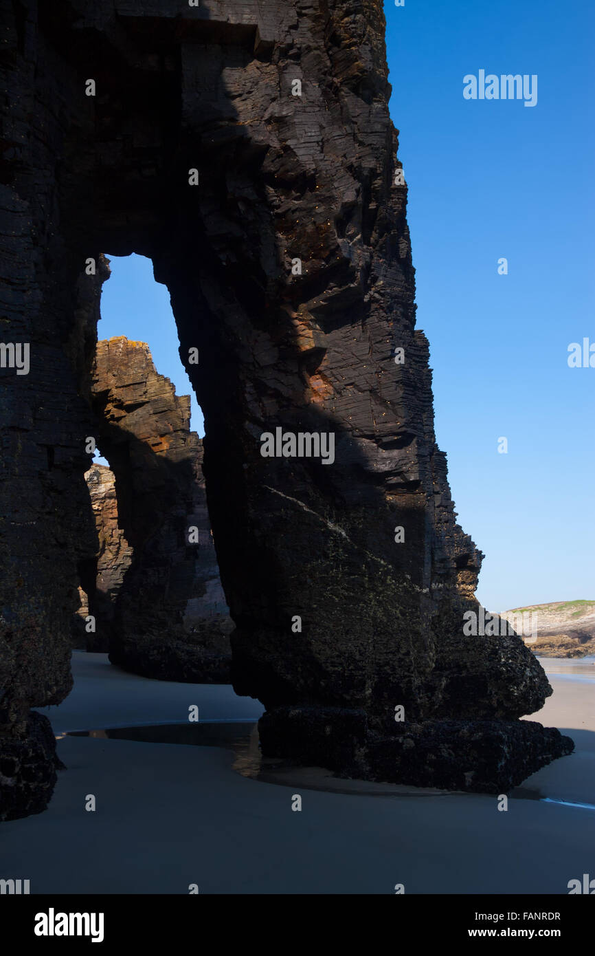 Natural arch in rocks at As Catedrais beach Stock Photo - Alamy