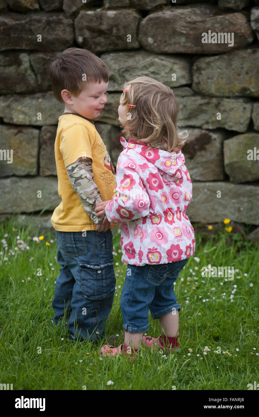 Two toddlers paying Stock Photo - Alamy