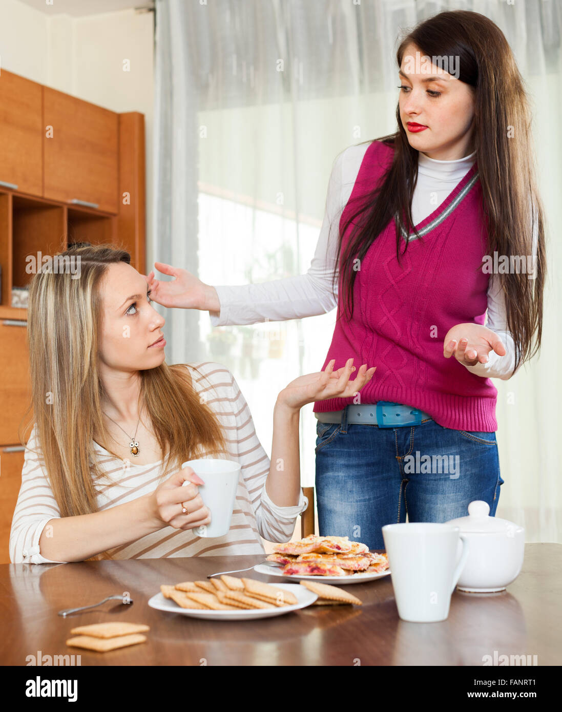 Two women chatting over tea hi-res stock photography and images - Alamy