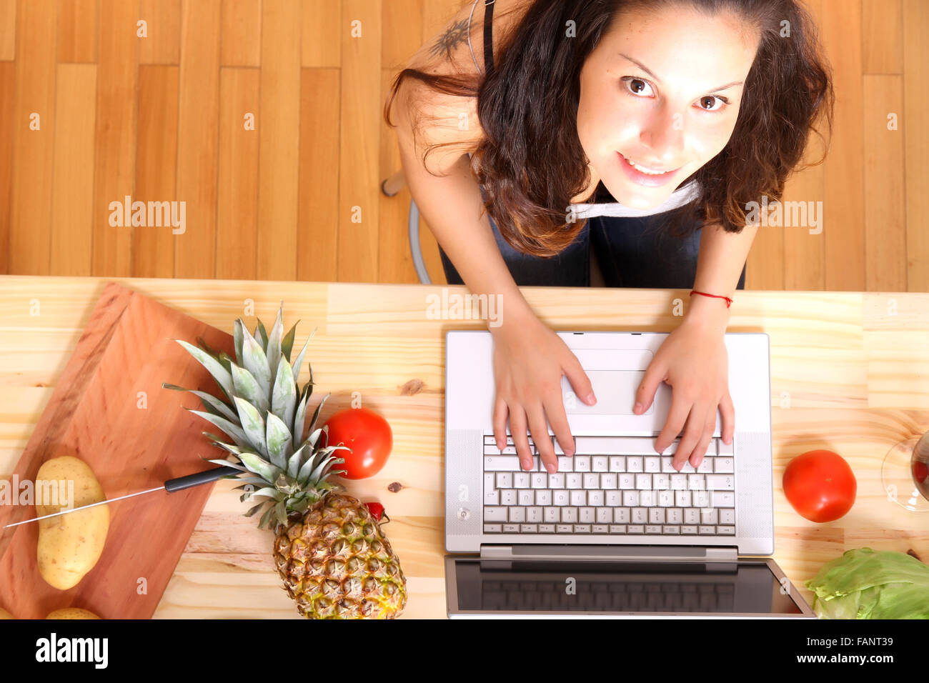 Cooking with some help from a Laptop Stock Photo - Alamy