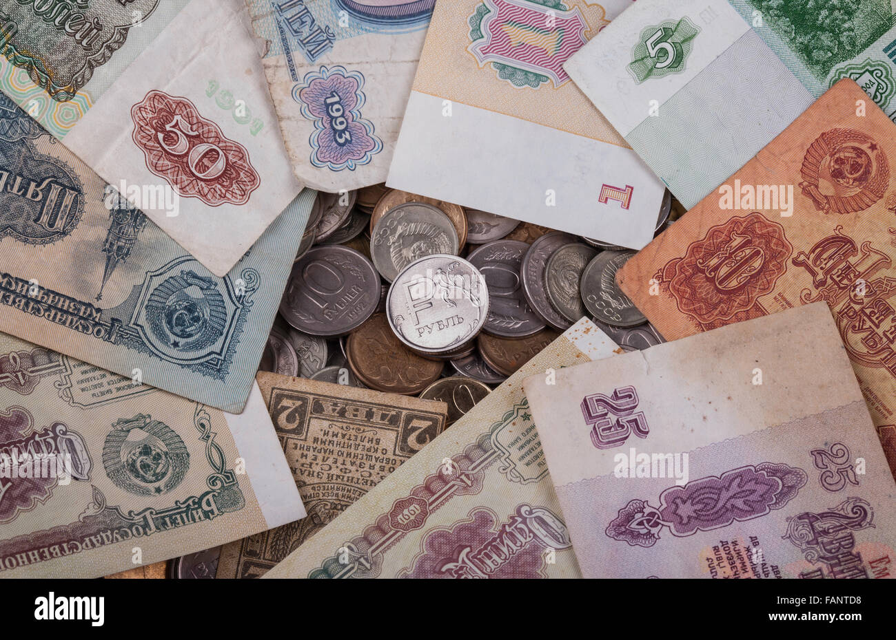 modern coin ruble surrounded by old banknotes of the USSR Stock Photo ...
