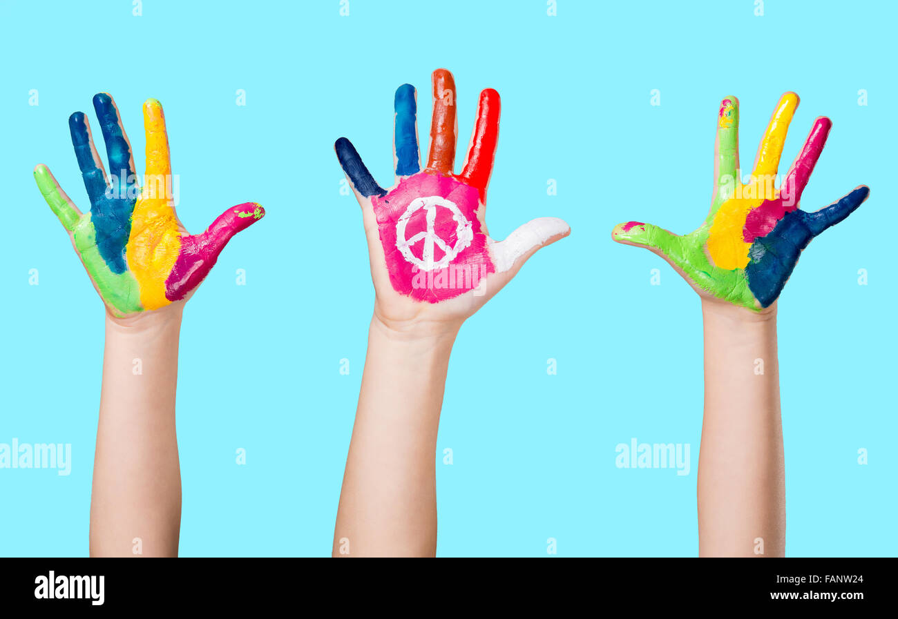 Painted peace sign in girl's hand against war Stock Photo - Alamy