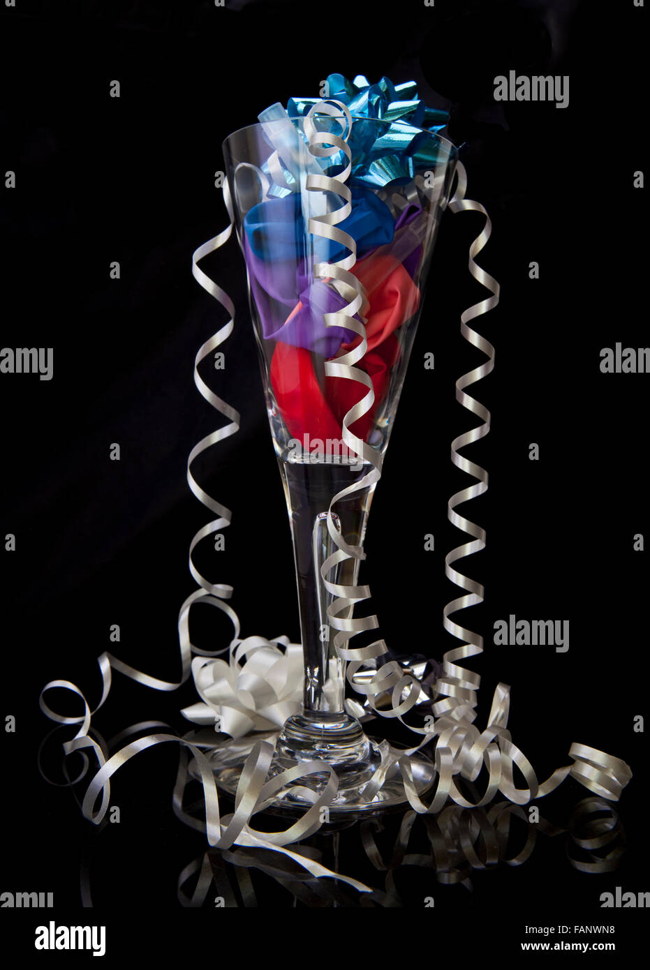 Party Fun Glass with Streamers Stock Photo - Alamy