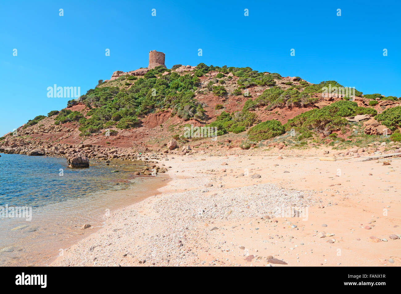 Porticciolo beach with its sighting tower, Sardinia Stock Photo - Alamy