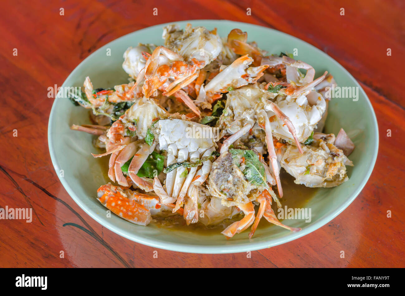 Stir fried Crab with chili & Basil leaves , spicy seafood dish Stock ...