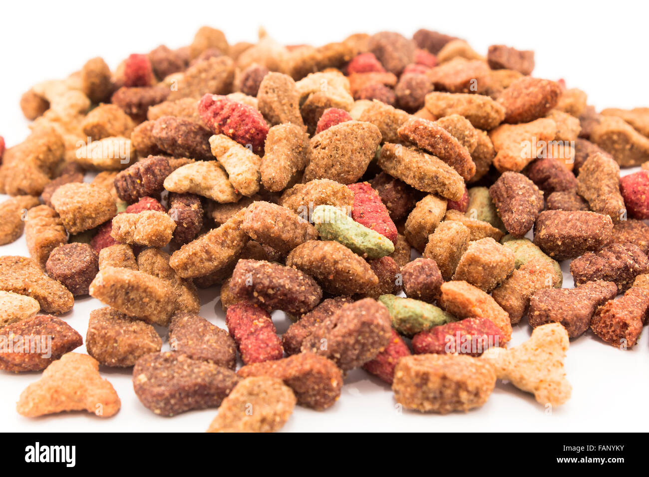 Cat Food, granules, on a white background Stock Photo - Alamy