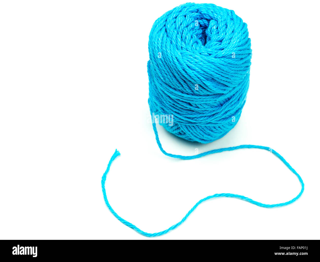 An isolated roll of blue yarn on the right side of the frame Stock ...