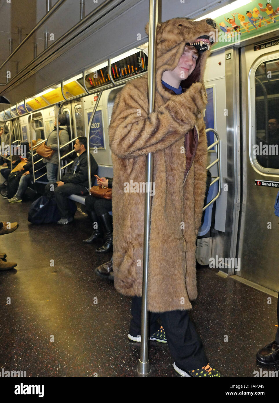 A tourist from Arizona photographed on a downtown F train in a bear ...
