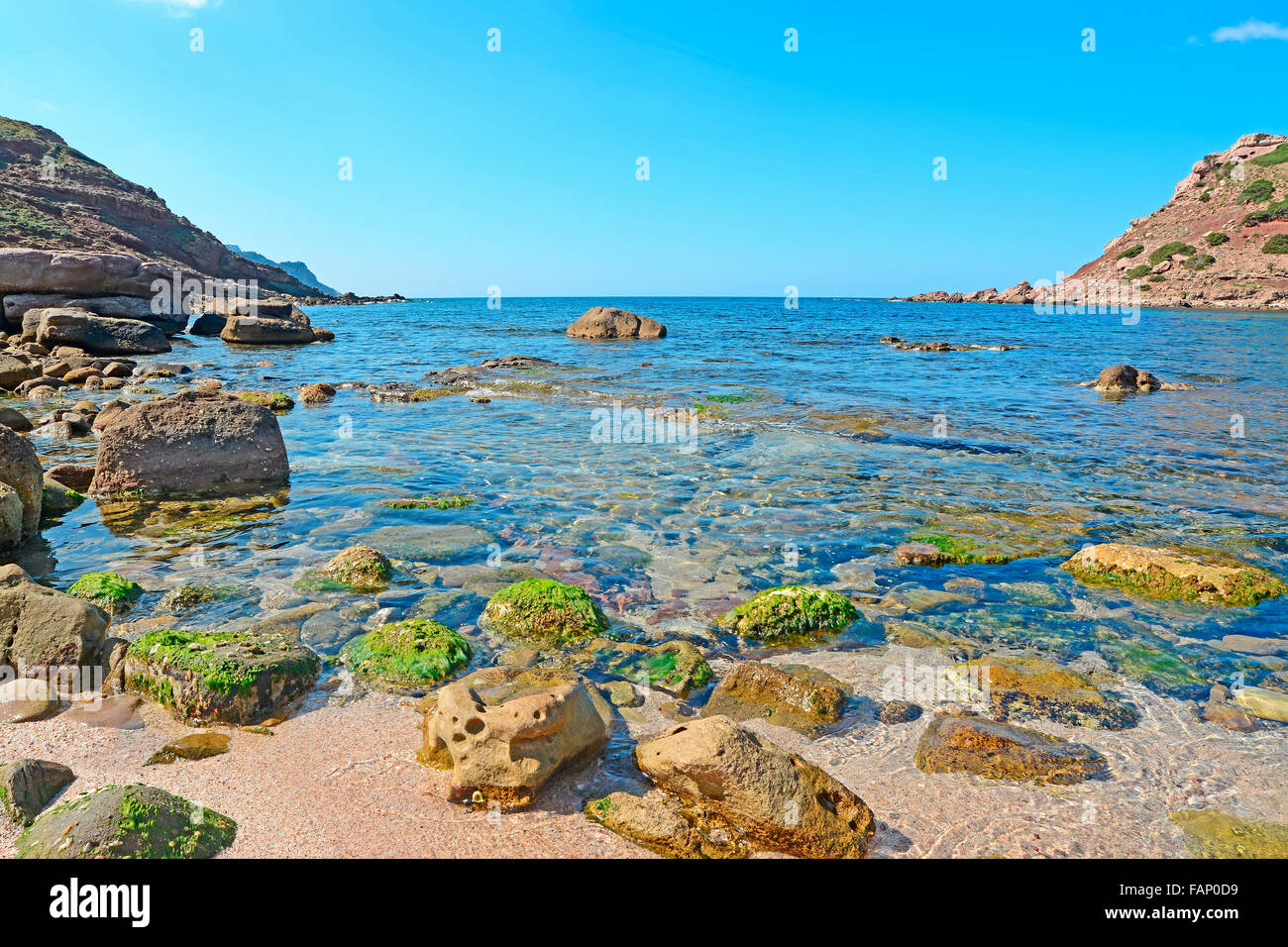 Porticciolo beach with its sighting tower, Sardinia Stock Photo - Alamy