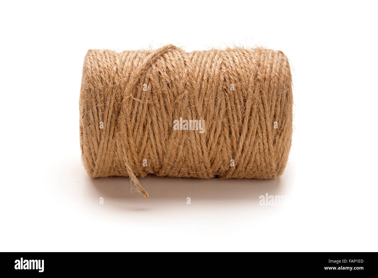 Ball of Jute string, often used for gardening isolated on white ...