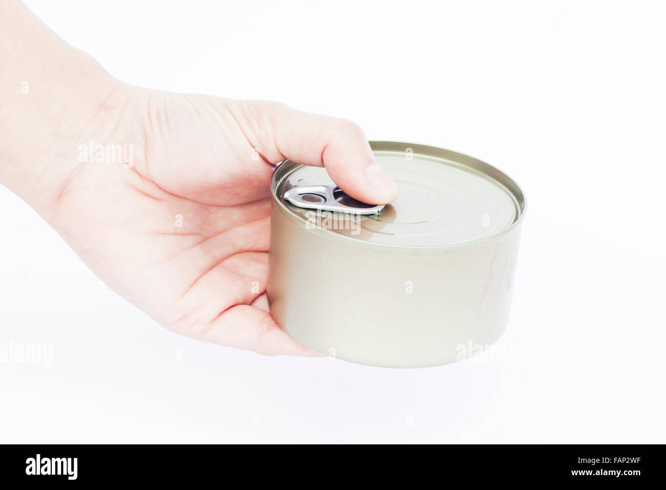 Close-up can with hand isolated on white background, stock photo Stock ...