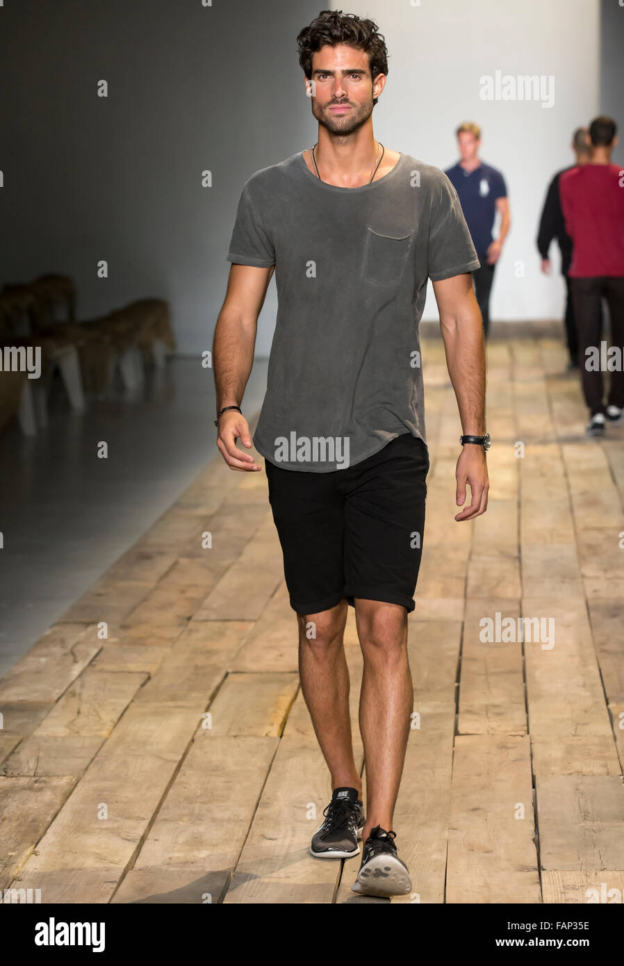 NEW YORK, NY - JULY 15, 2015: Juan Betancourt walks the runway during ...