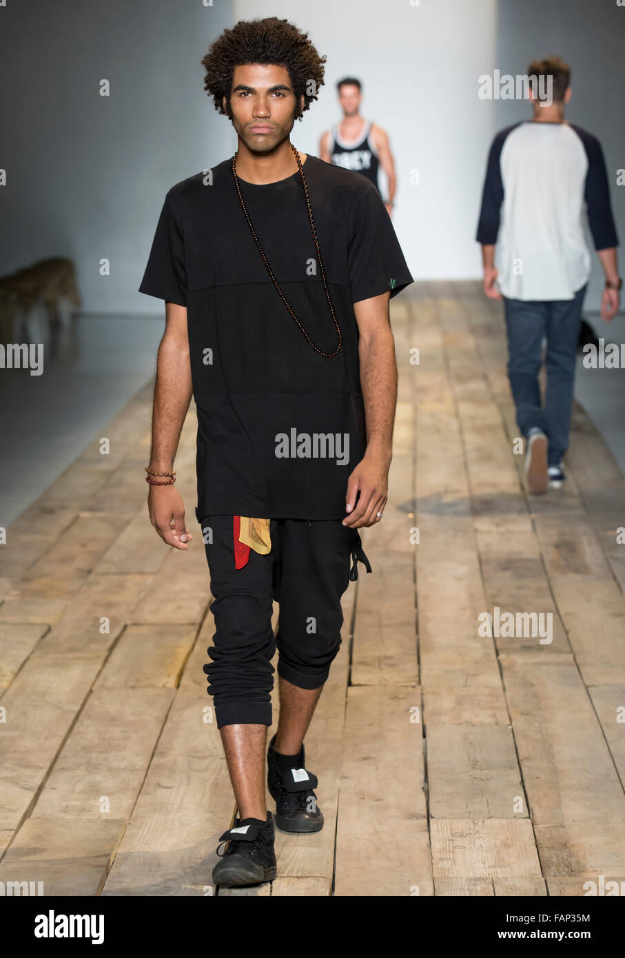 NEW YORK, NY - JULY 15, 2015: A model walks the runway during rehearsal ...