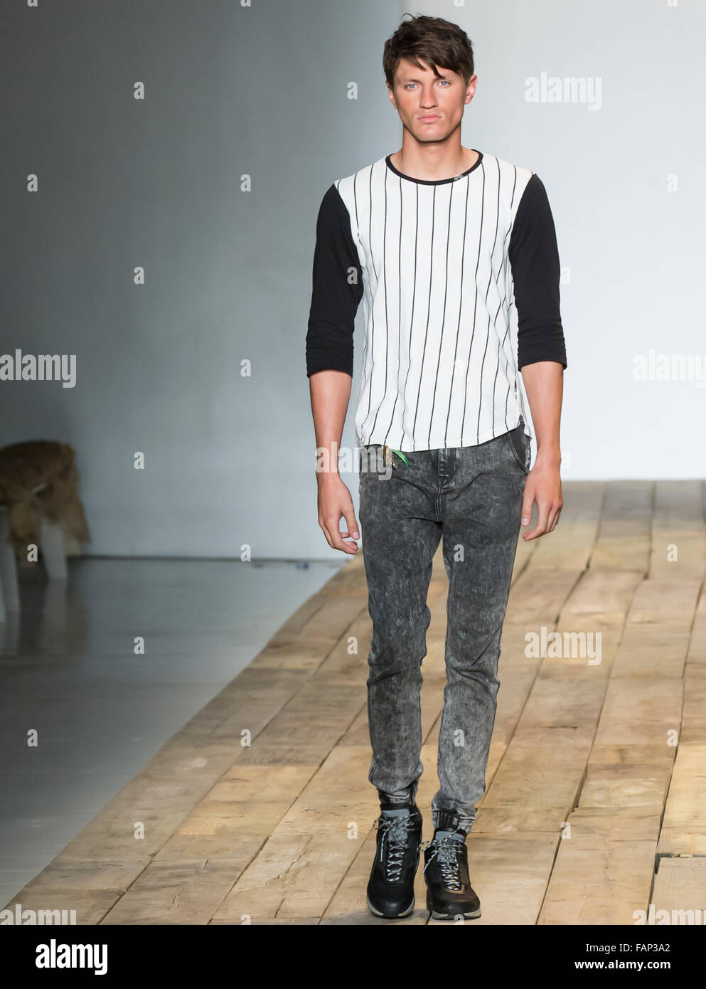 NEW YORK, NY - JULY 15, 2015: Eli Hall walks the runway during ...
