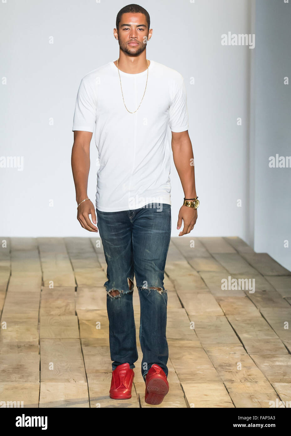 NEW YORK, NY - JULY 15, 2015: Shayne Cureton walks the runway during ...