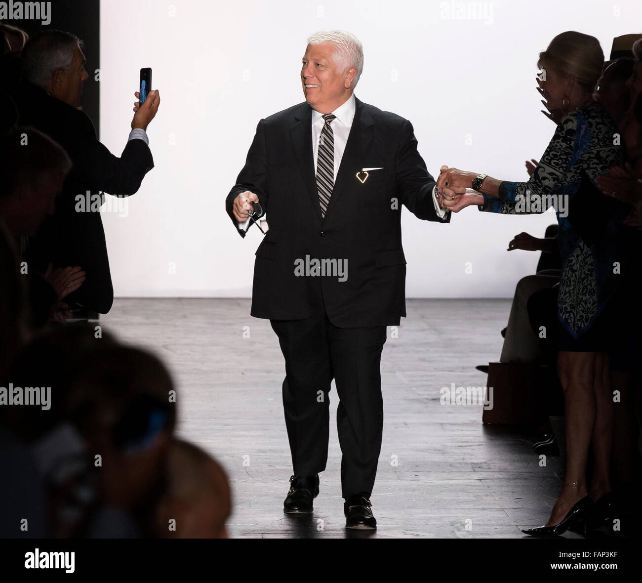 New York, NY - September 15, 2015: Designer Dennis Basso walks the ...