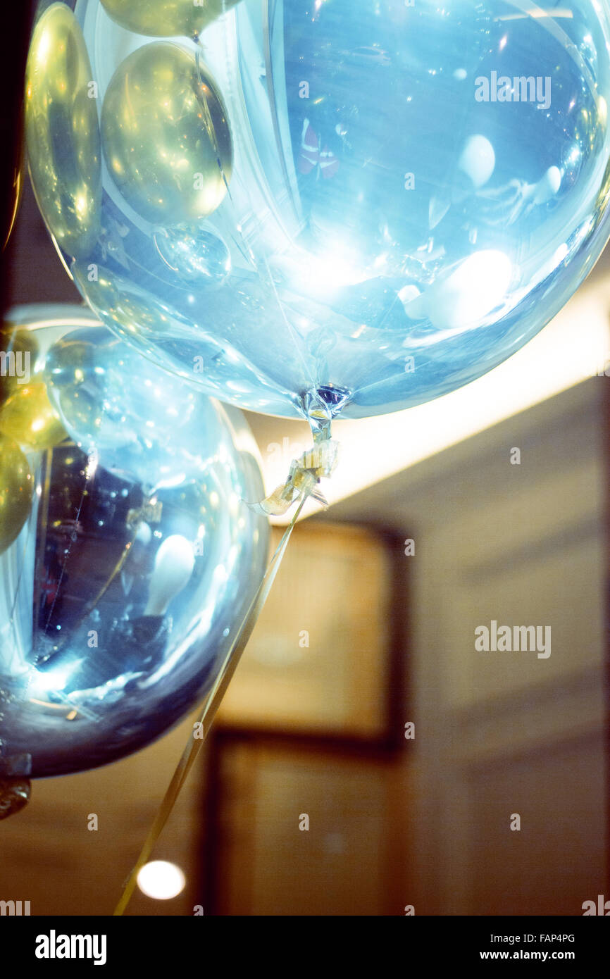 Birthday party metallic balloons photo Stock Photo - Alamy