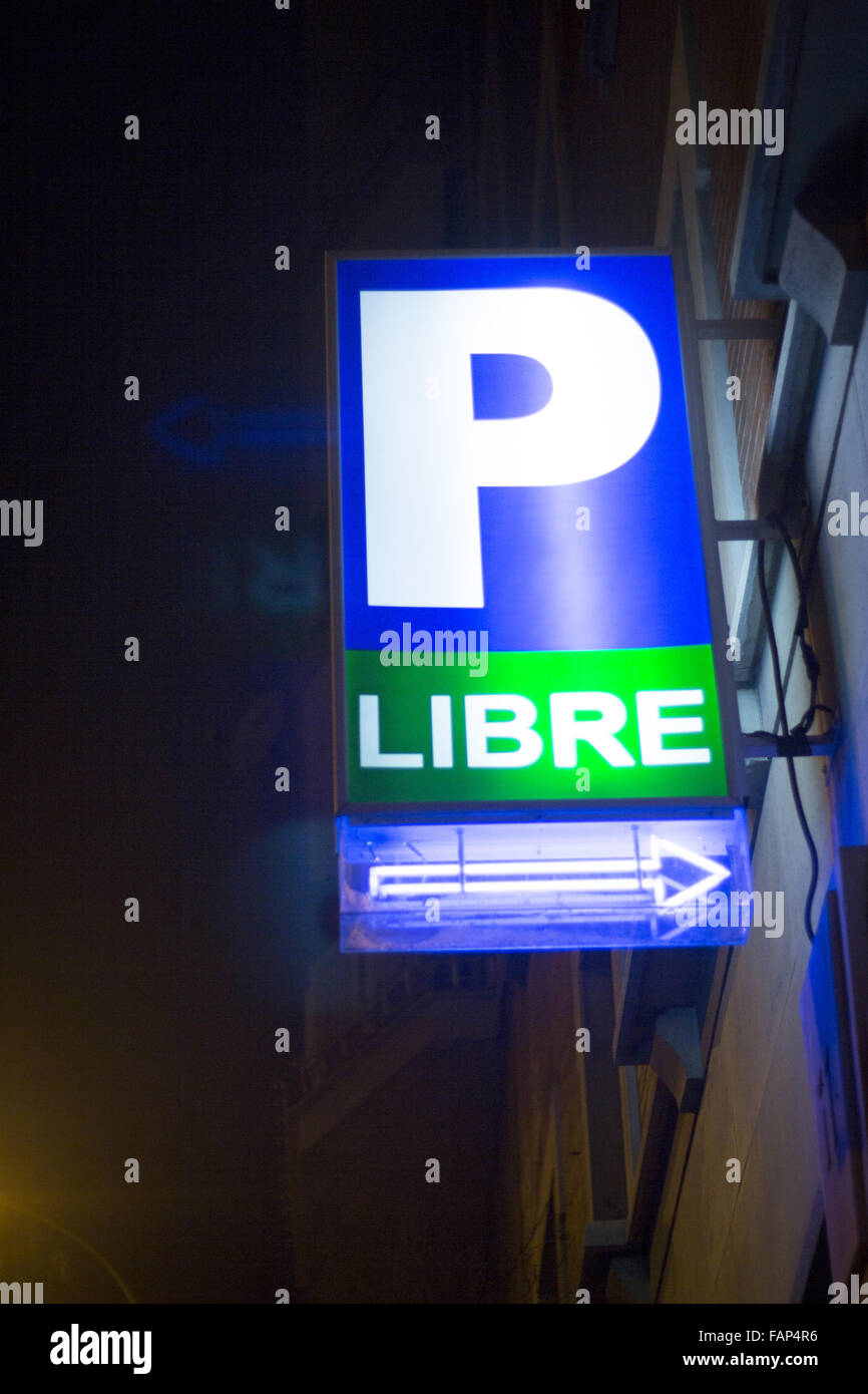 Car park light sign at night photo in Spain showing libre in Spanish or ...