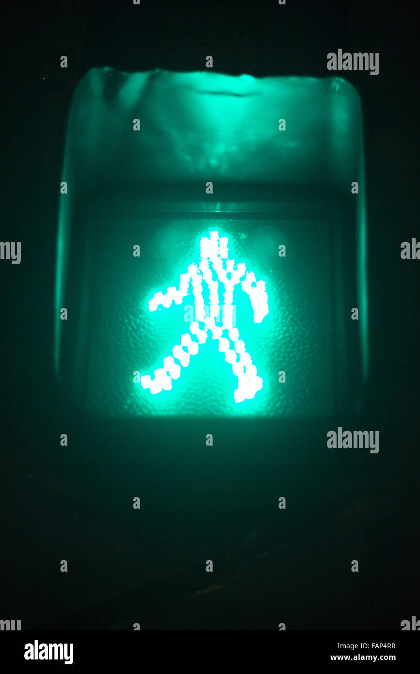 Green man go pedestrian walking traffic light sign photograph Stock ...
