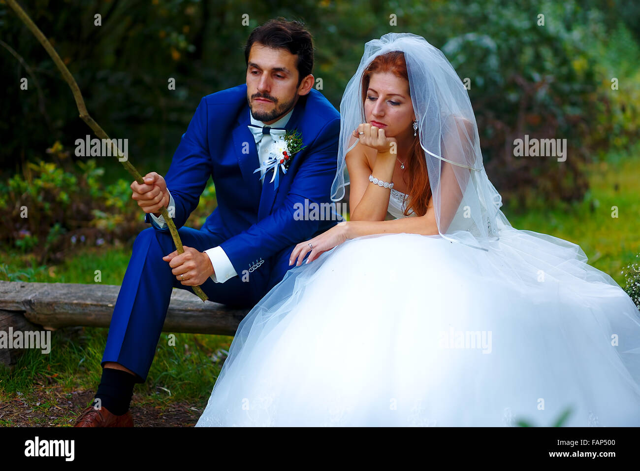 bride and groom fishing together - romantic wedding concept Stock Photo ...