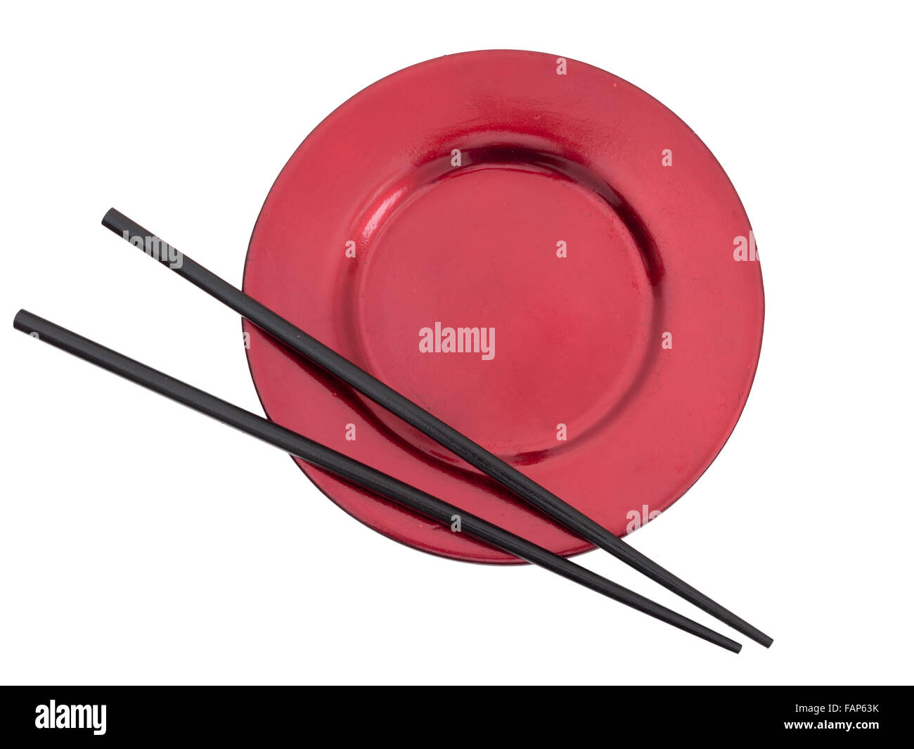 Plain chopsticks with red empty plate isolated on white Stock Photo - Alamy