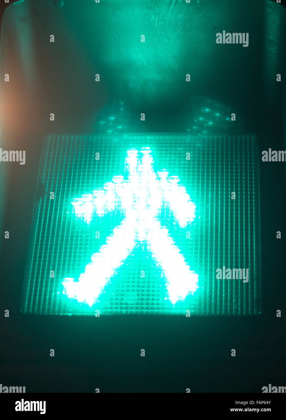 Green man go pedestrian walking traffic light sign photograph Stock ...