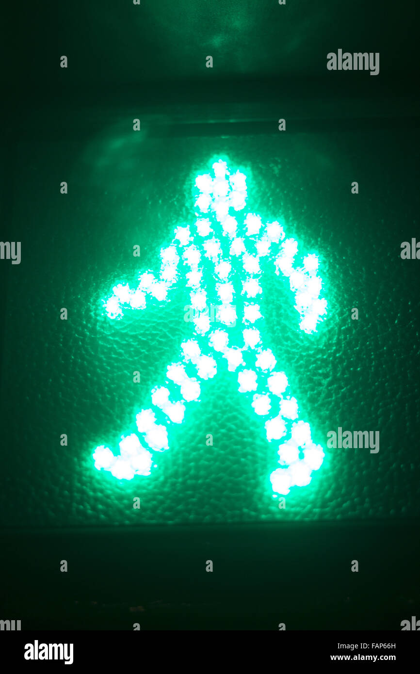Green man go pedestrian walking traffic light sign photograph Stock ...