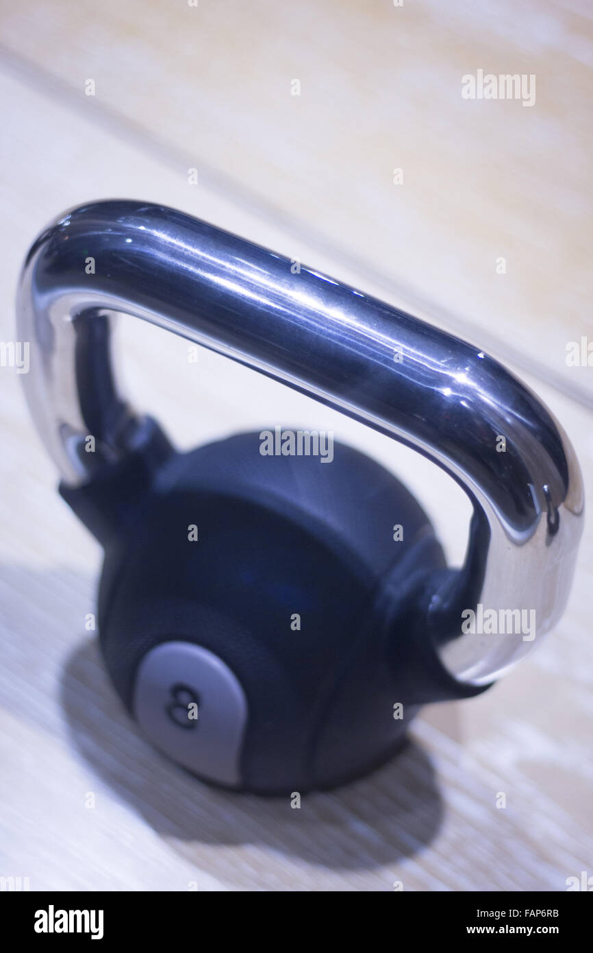 Gym fitness equipment exercise kettle ball photo Stock Photo - Alamy