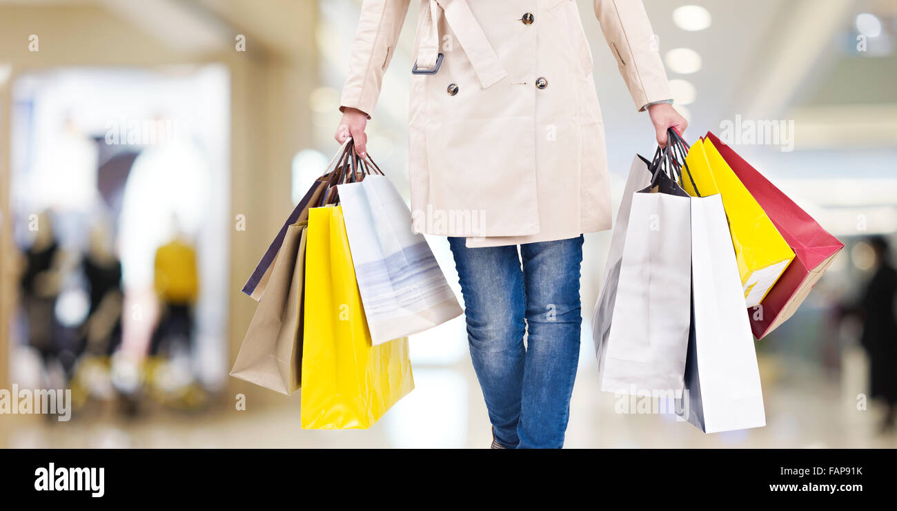 Christmas shopping woman walking hi-res stock photography and images ...