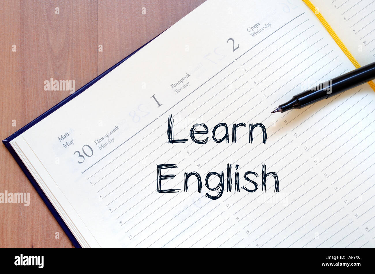 Learn english text concept write on notebook with pen Stock Photo - Alamy